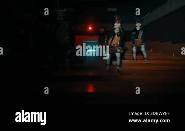Dynamic, fast-moving shot of a female dance troupe in traditional ...