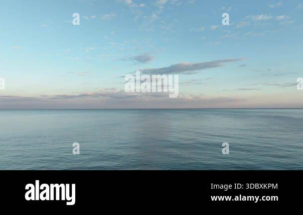Video flight over ocean, sea on sunrise. Close to the water Stock Video ...