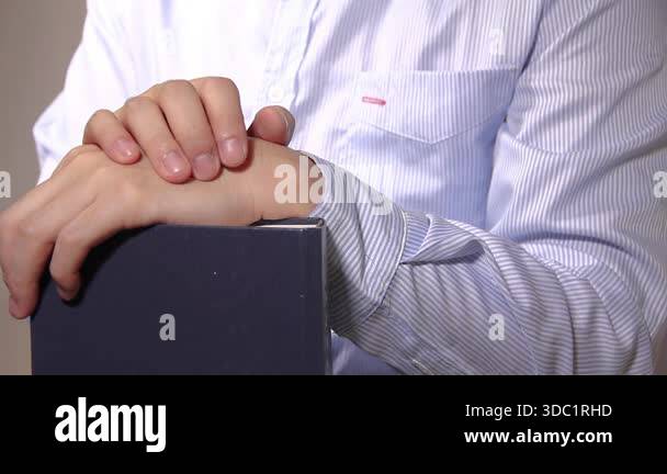 Hands resting in calm embrace, a moment of tranquility captured in ...