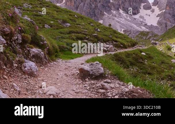 Hiking trails winding through Dolomite Alps with majestic peaks ...