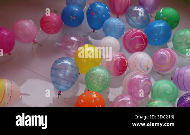 Colorful balloons fill the play area with joy and laughter as children ...