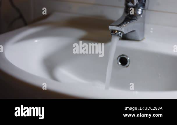 Testing cellphone screen for water resistance Stock Video Footage - Alamy