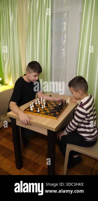 Kids playing chess wooden chess Stock Videos & Footage - HD and 4K ...