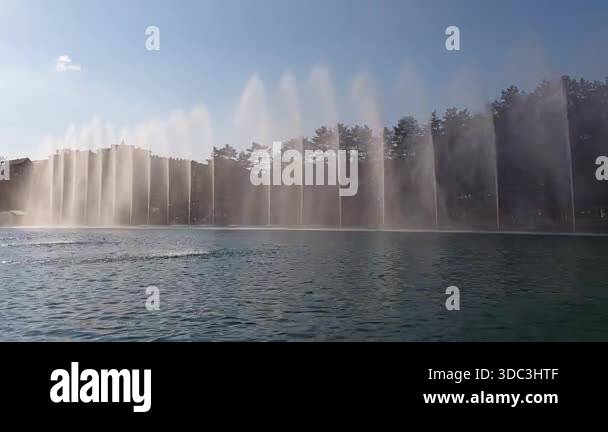 Enjoy stunning water dance show footage featuring synchronized ...