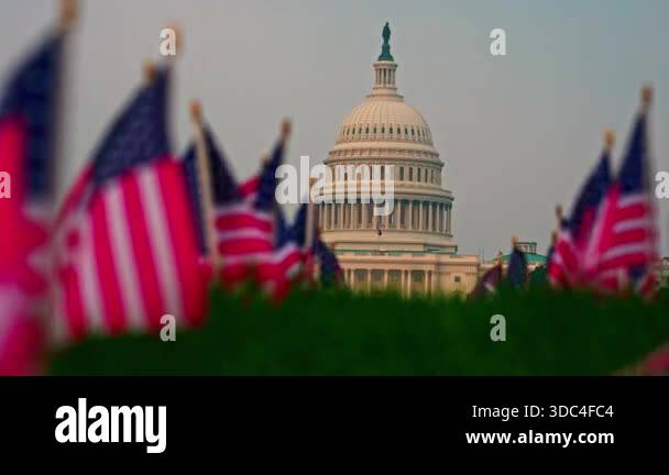 Capitol building national symbol patriotism. American flag waving at ...
