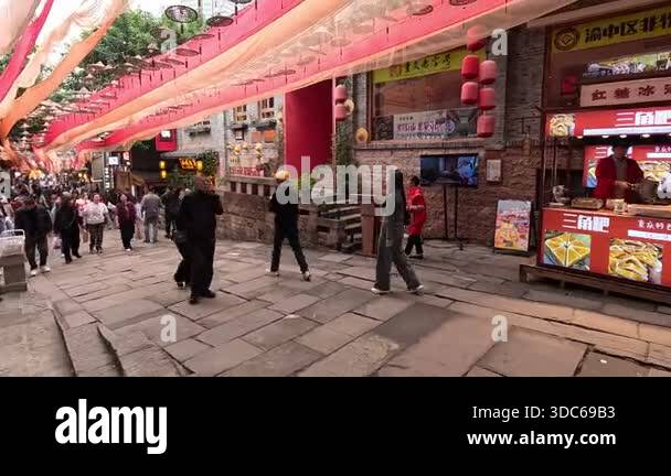 Chongqing, China- 3 Nov 2025: Tourists visit Shibati or Eighteen Stairs ...