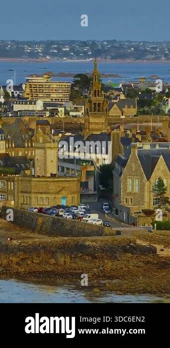 Aerial view of Roscoff cityscape, with Roscoff jetty in the background ...