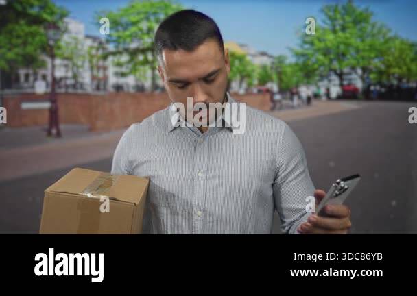 Man holds cardboard package checks Stock Videos & Footage - HD and 4K ...