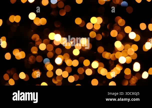 Soft warm abstract golden glowing bokeh lights shimmering gently ...