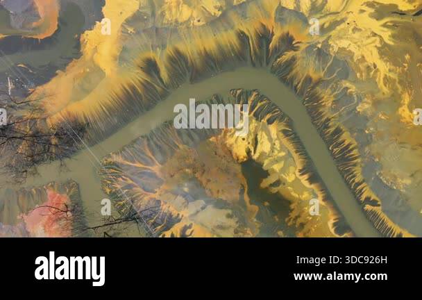 Surreal aerial view of colorful chemical mine waste waters. Nature ...