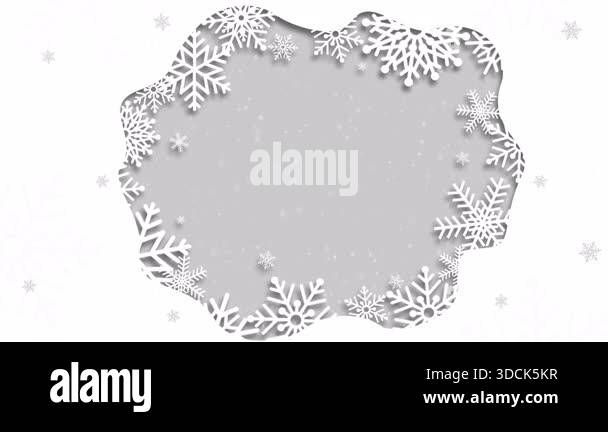 White snowflakes arranged around gray center with subtle snowfall and ...