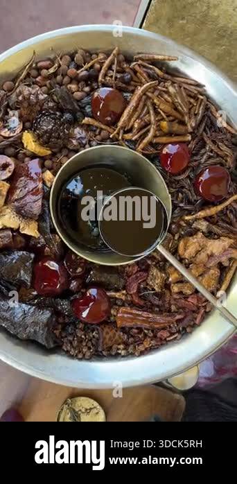 Jadi buti oil surrounded with pushkarmool and all the other ayurvedic ...