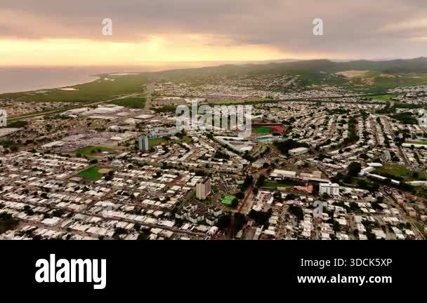 Panoramic aerial top view of the city of Ponce, Puerto Rico, at sunset ...