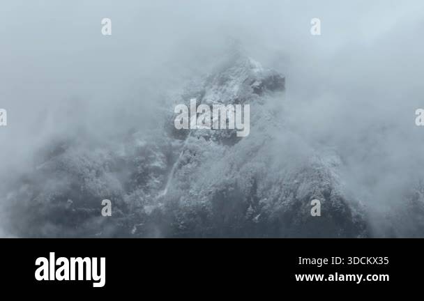 Aerial view cloudy sky over snow-capped Andes mountains in Coyhaique ...