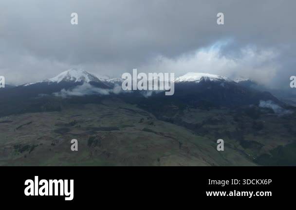 Aerial view cloudy sky over snow-capped Andes mountains in Coyhaique ...