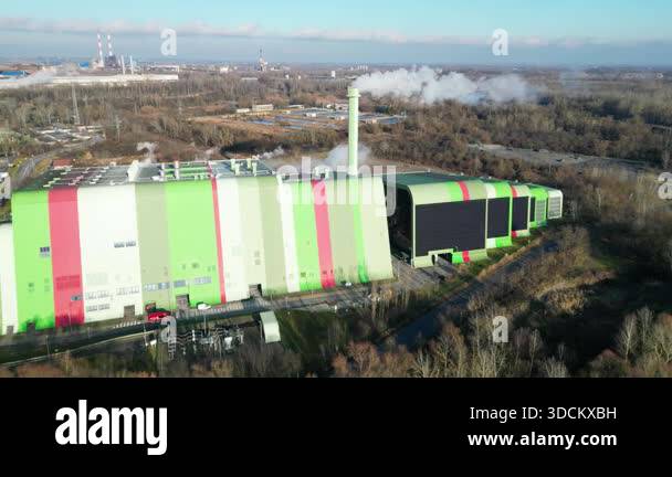 Aerial view of a modern factory showcasing vibrant colored buildings ...