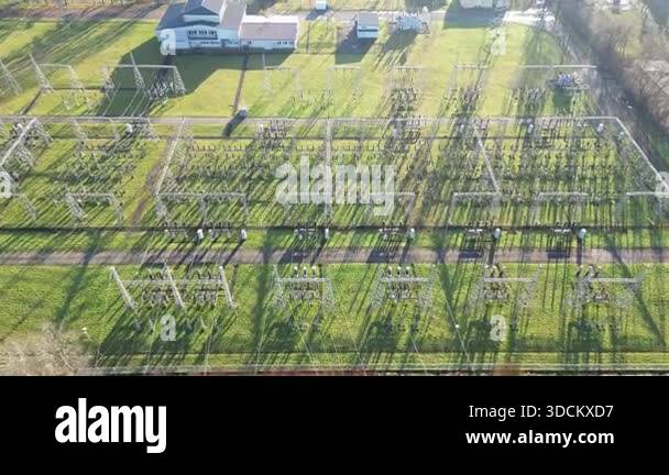Aerial view of expansive electrical substation showcasing intricate ...