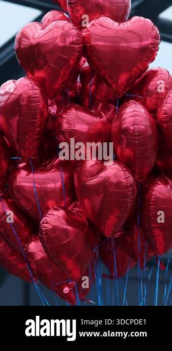 Red Heart-Shaped Balloons Tied As A Valentines Day Gift, Vertical Video ...
