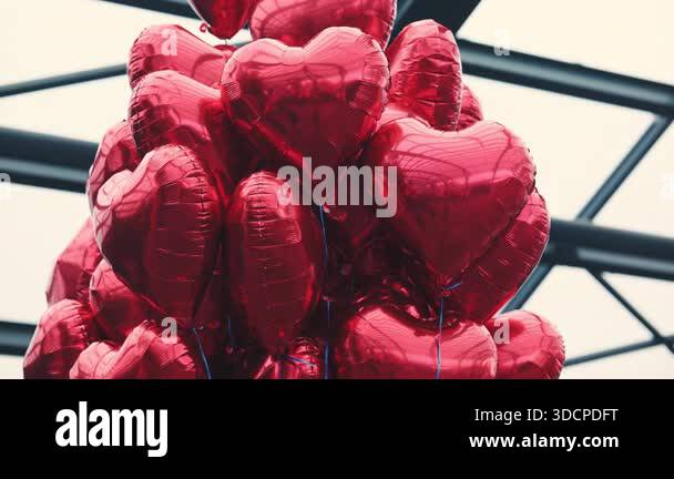 Red Heart-Shaped Balloons Tied As A Valentines Day Gift Stock Video ...