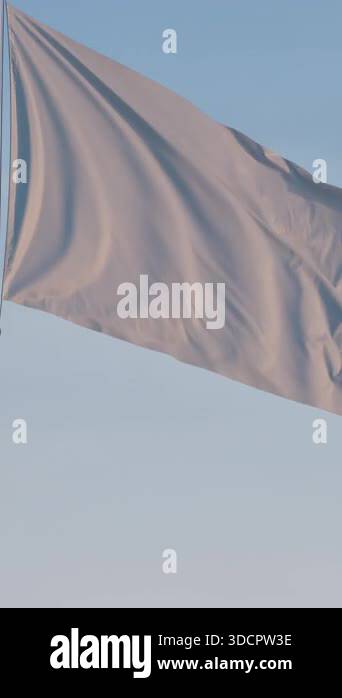 White Flag: Cinematic Vertical Waving Flag Against Blue Sky Stock Video ...
