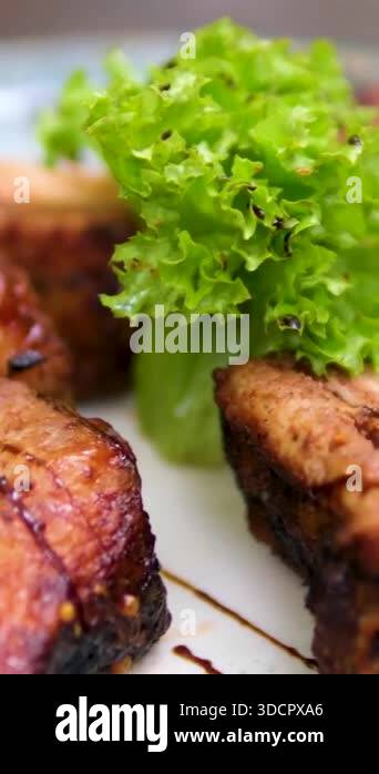 Chef slicing freshly grilled juicy beef steak meat kitchen, food close ...