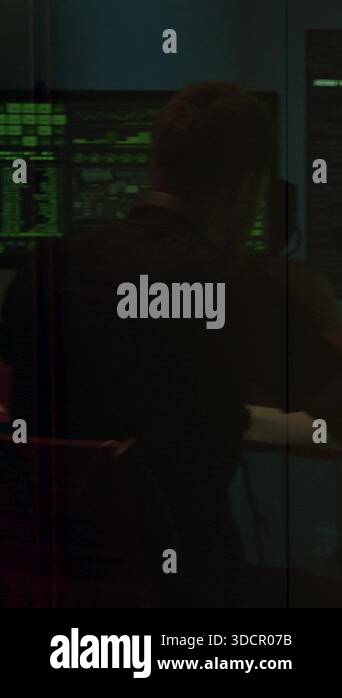 A dedicated programmer engages in a coding session, surrounded by ...