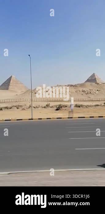 The Pyramids of Egypt are seen at a Distance Footage. Watch the ...