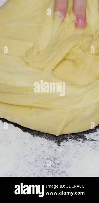 process of making homemade cruffins. Rolling yeast dough, adding butter ...