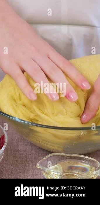 process of making homemade cruffins. Rolling yeast dough, adding butter ...