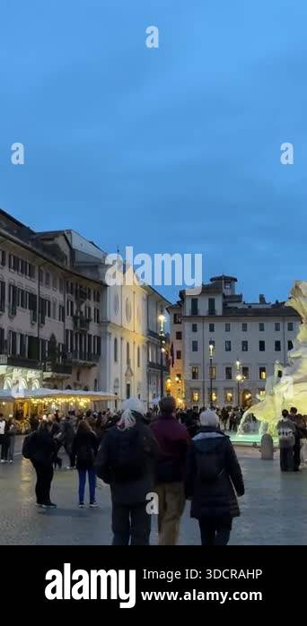 evening scene at Piazza Navona in Rome featuring iconic fountain lively ...
