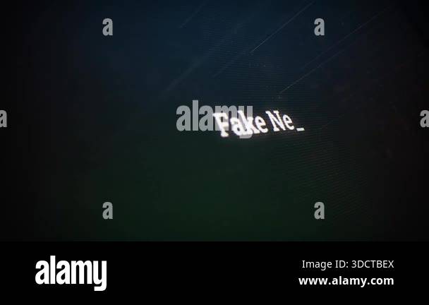 Fake News on digital screen message on computer screens Stock Video ...