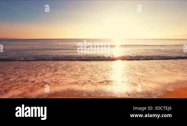 Beautiful golden sea sunrise over tropical island beach shore and ocean ...