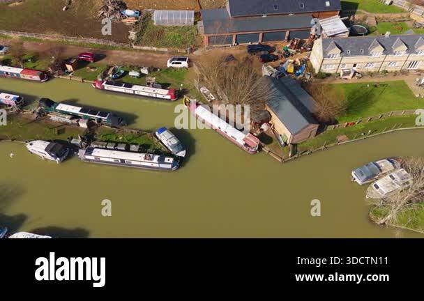 Aerial view of canal barge boats, river and lock systems, lake. Sunny ...