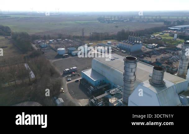 Aerial view of large power plant, electrical energy generation, smoke ...