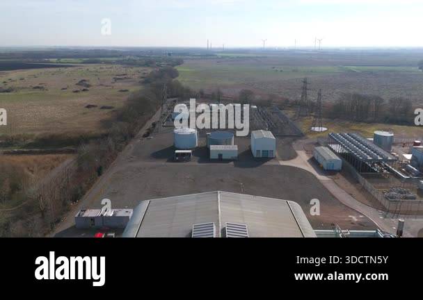 Aerial view of large power plant, electrical energy generation, smoke ...