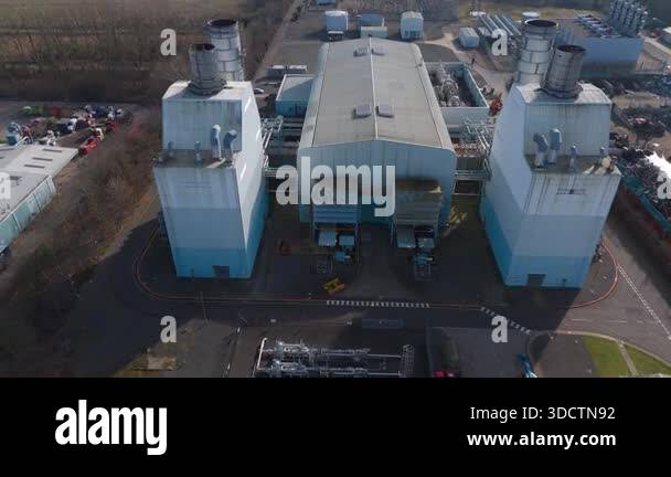 Aerial view of large power plant, electrical energy generation, smoke ...