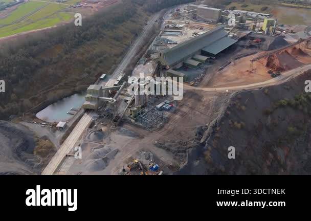 Aerial drone perspective of huge quarry, open pit mine, gravel and rare ...