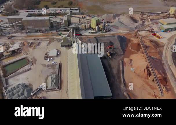 Aerial drone perspective of huge quarry, open pit mine, gravel and rare ...