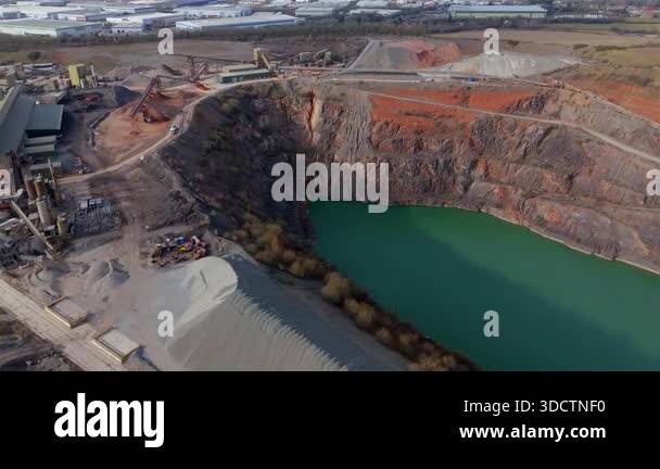 Aerial drone perspective of huge quarry, open pit mine, gravel and rare ...