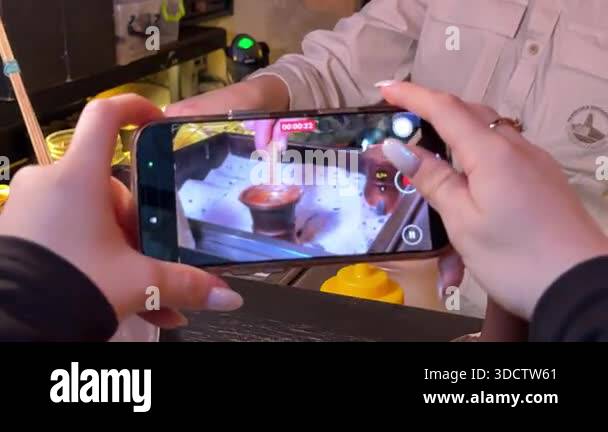 Turkish coffee Phone recording cooking. girl taking a picture of coffee ...