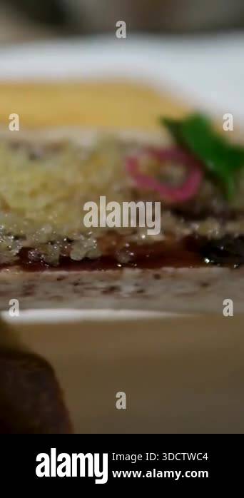roasted beef marrow bone elegantly presented on a white plate rich and ...
