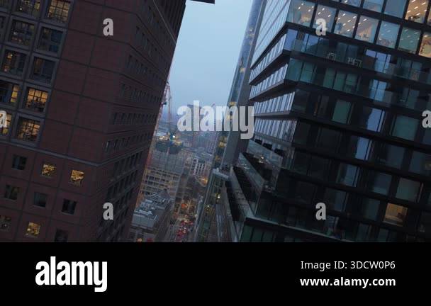 Dutch tilt aerial perspective through financial district of Frankfurt ...