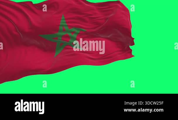 Morocco national flag waving in the wind isolated on green background ...