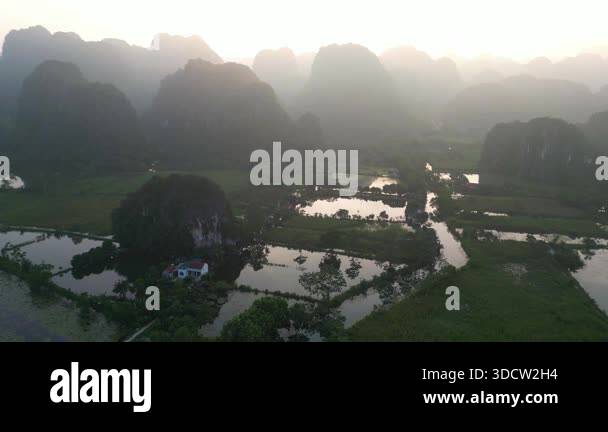 Asia, Land flooded by summer typhoon in Ninh Binh and Tam Coc in Red ...