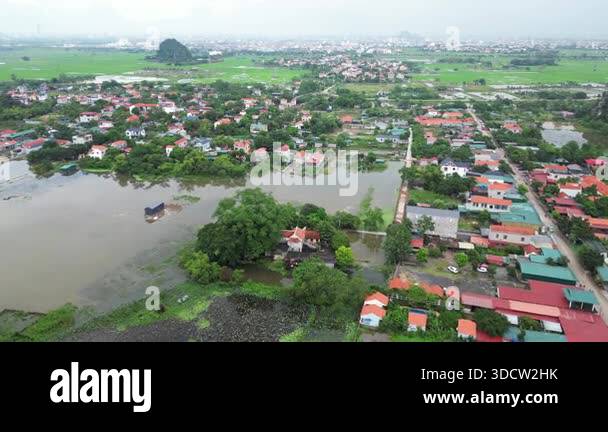 Asia, Land flooded by summer typhoon in Ninh Binh and Tam Coc in Red ...