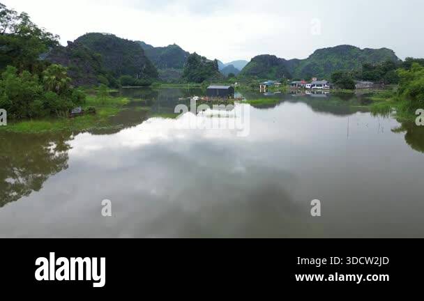 Asia, Land flooded by summer typhoon in Ninh Binh and Tam Coc in Red ...