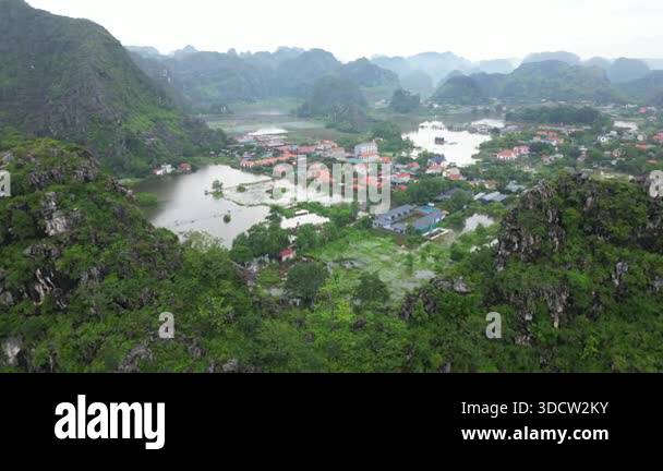 Asia, Land flooded by summer typhoon in Ninh Binh and Tam Coc in Red ...