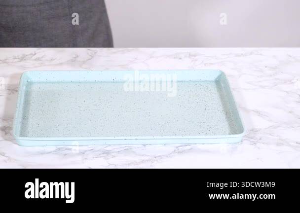 Ceramic baking tray Stock Videos & Footage - HD and 4K Video Clips - Alamy
