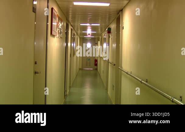Ship Interior Corridor With Emergency Exit Sign, Safety Handrails and ...