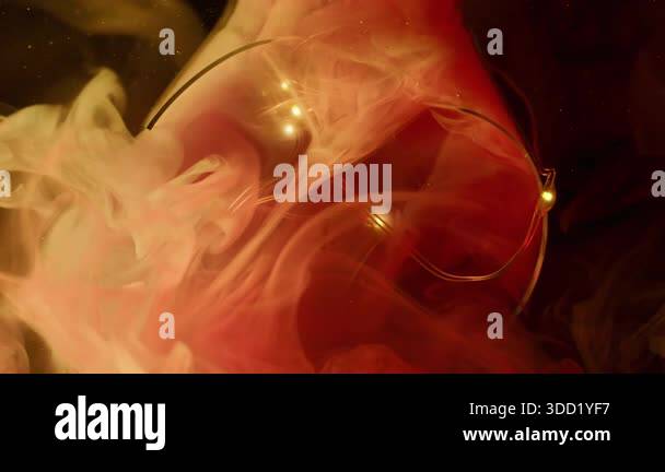Paint illumination flow. Dye swirl. Red orange smoke mix color in ...